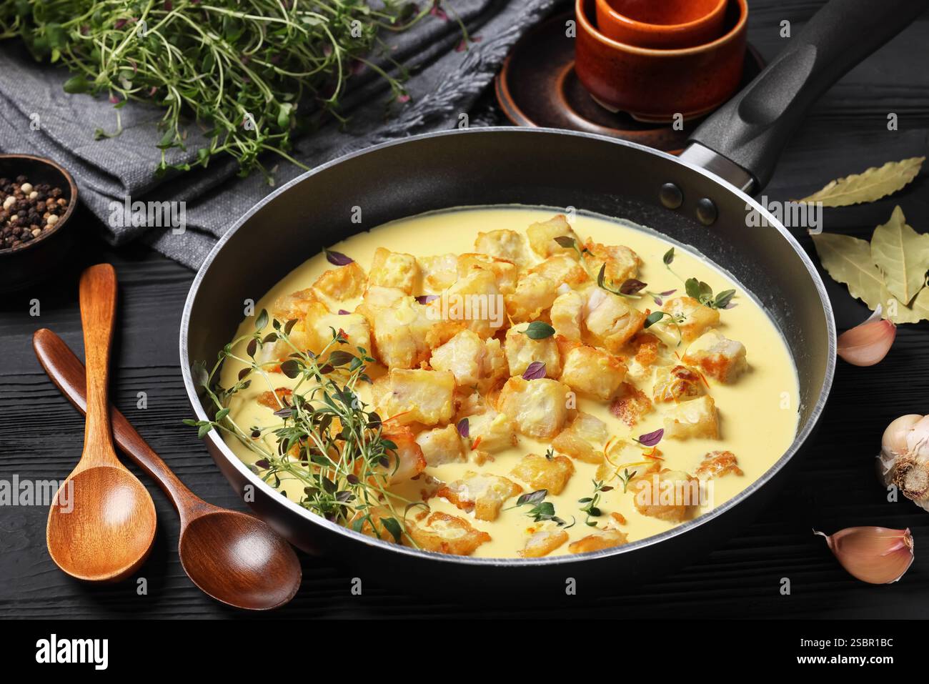 alaska pollock cubes browned and poached in cream saffron sauce with ...