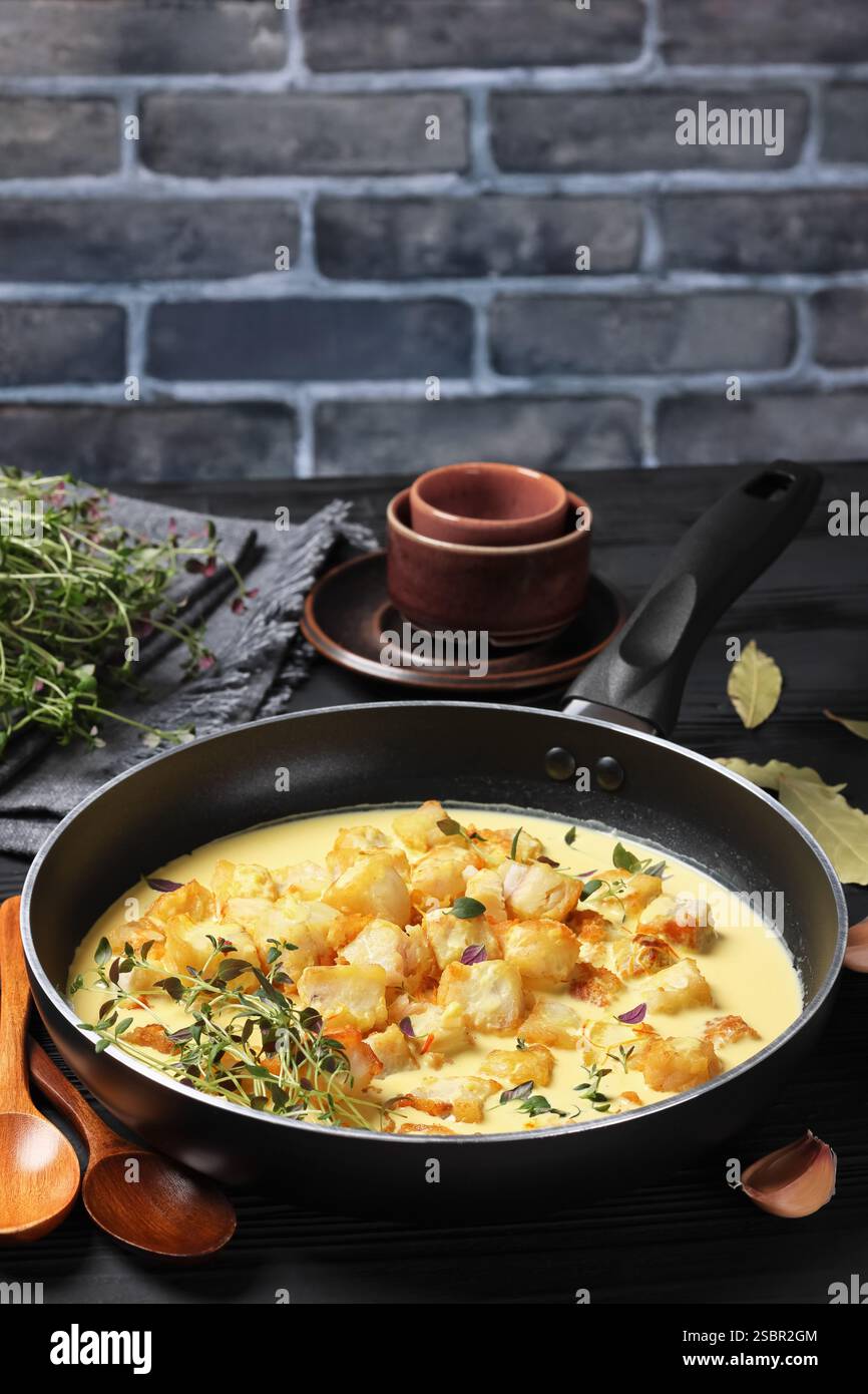 alaska pollock cubes browned and poached in cream saffron sauce with ...