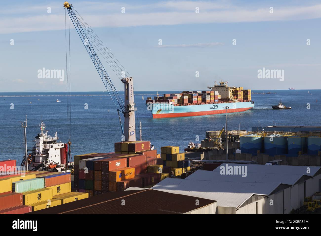 Maersk Serangoon cargo ship loaded with metal box shipping containers ...