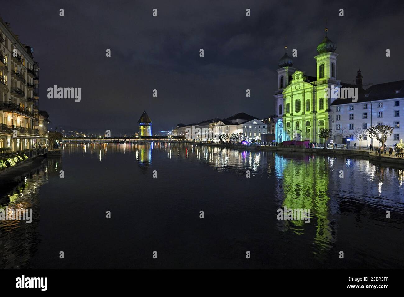 Water tower and Jesuit church on the right with light installation, on ...