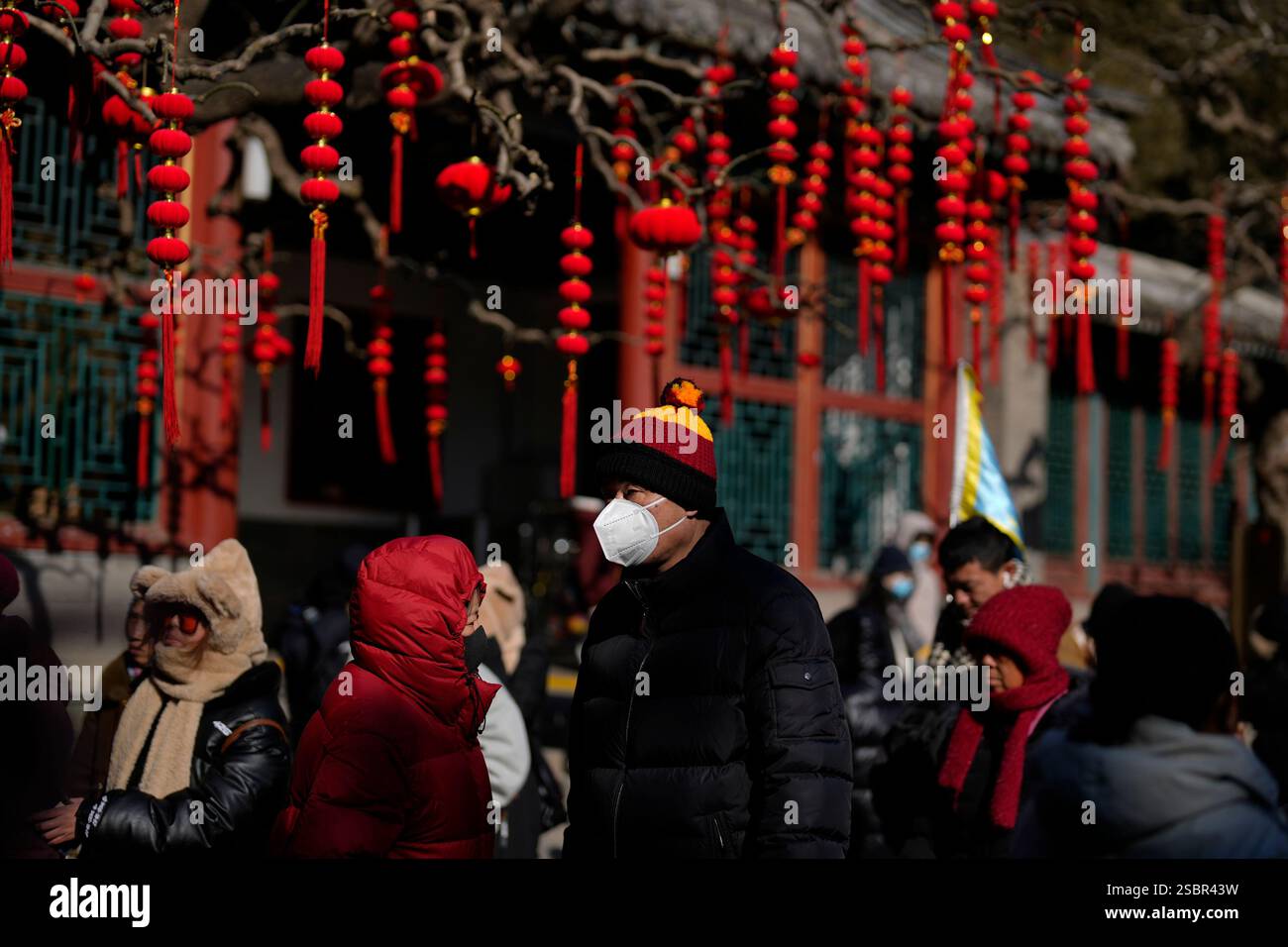 People visit the popular Summer Palace in Beijing on Tuesday, Feb. 4 ...