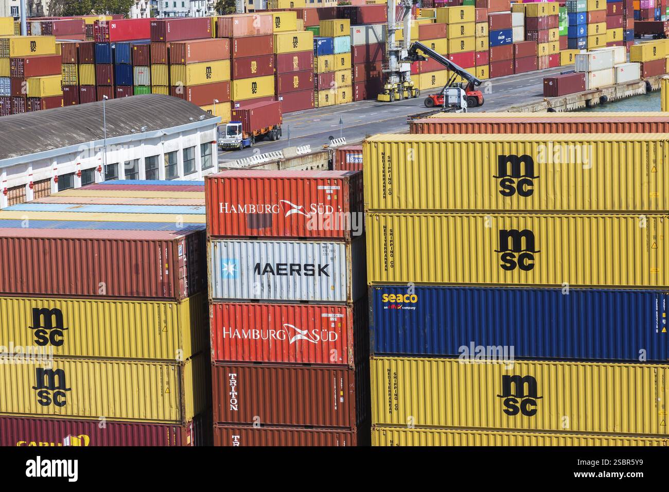 Stacked rectangular metal box shipping containers, transportation truck ...