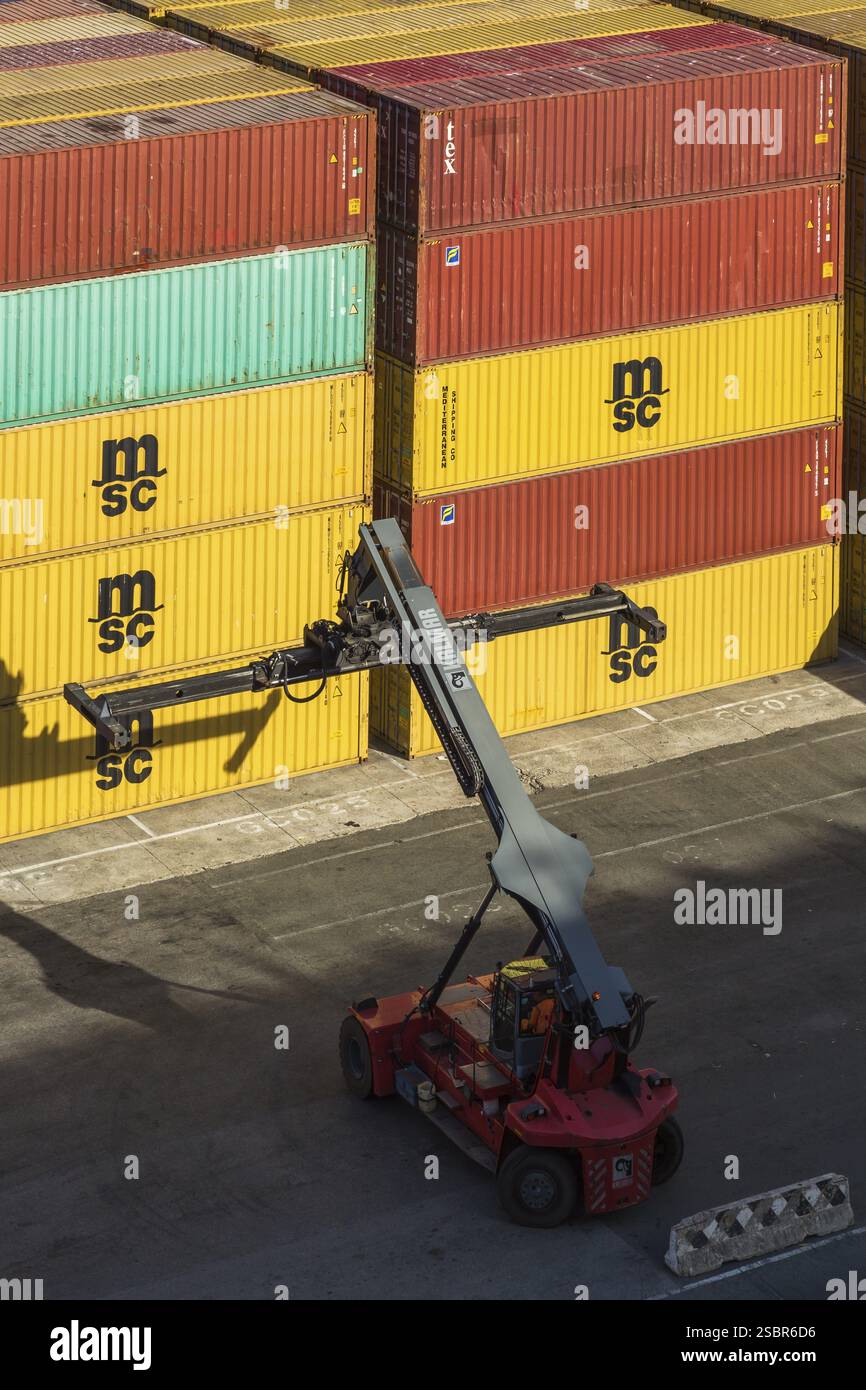Top view of Kalmar container handler and stacked rectangular metal box ...