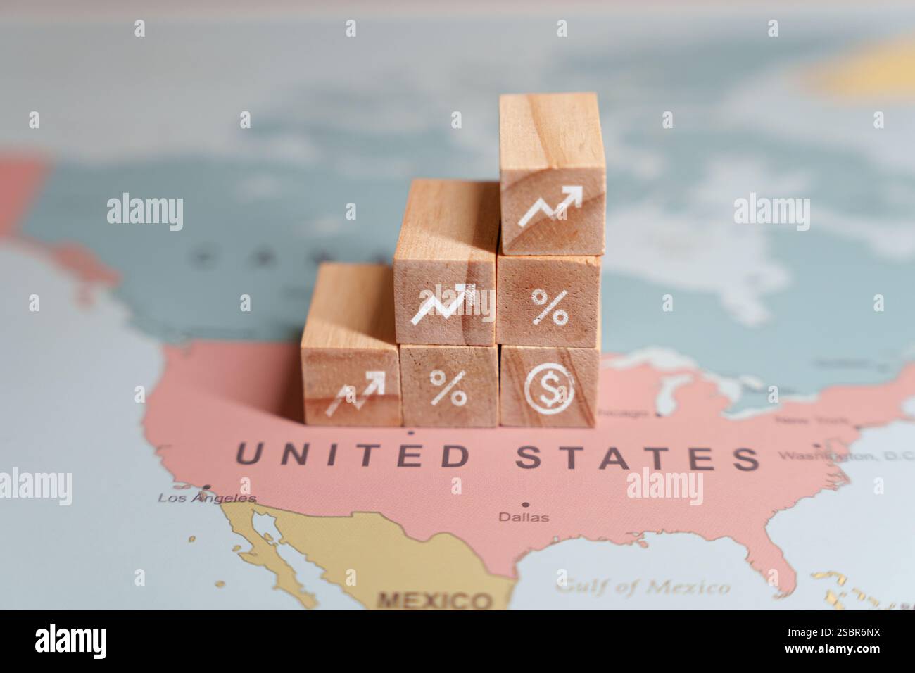 Wooden blocks arranged in a rising bar graph pattern, each block ...