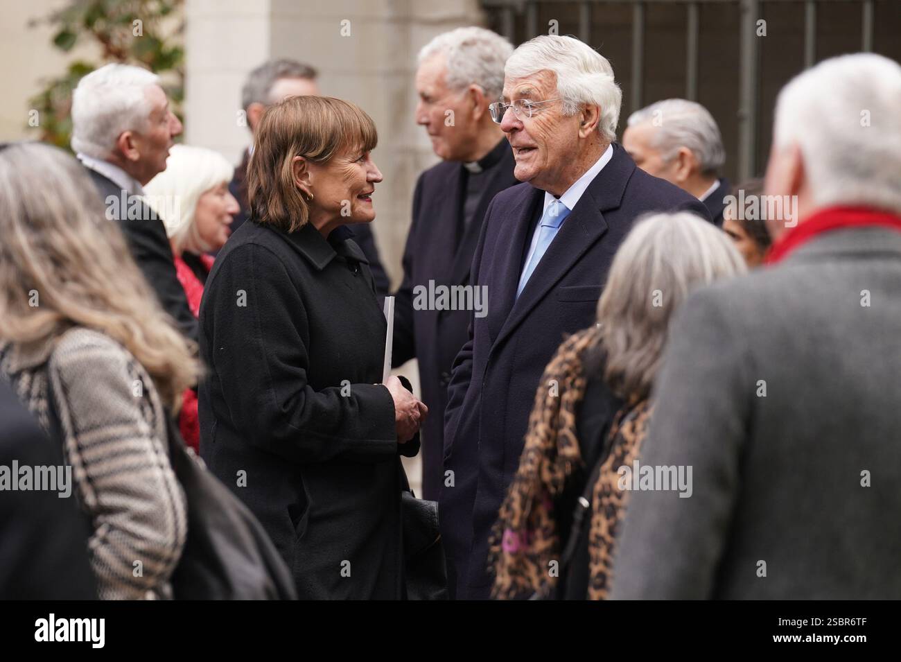 Former Prime Minister Sir John Major speaking to Anji Hunter following ...
