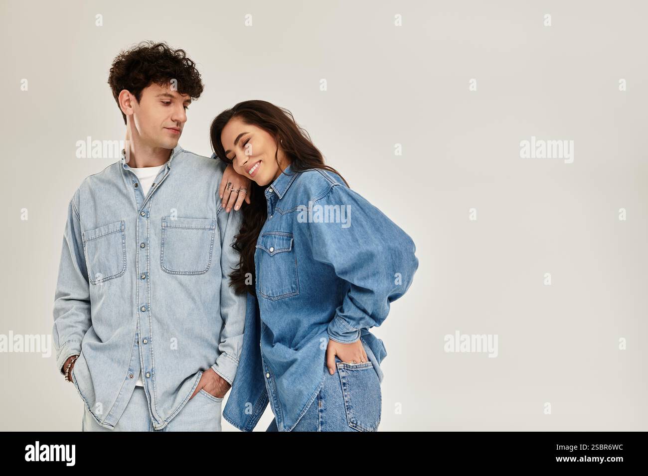 Couple shows off trendy hi-res stock photography and images - Alamy