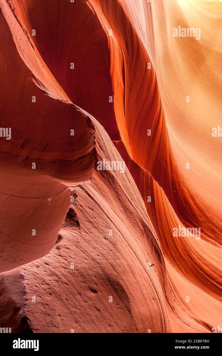 A rock formation with a red and orange color. The rock formation is ...