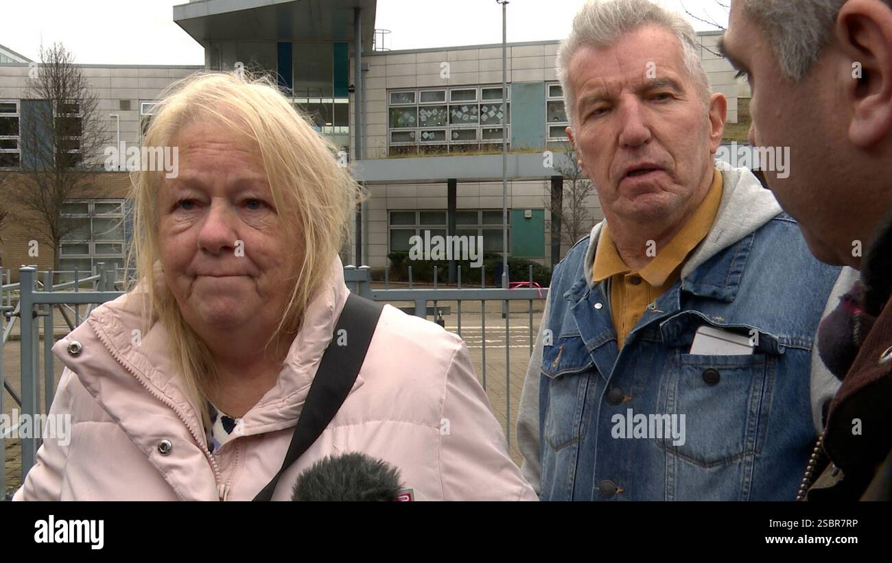Brenda and Keith Bartholomew, speak to media outside All Saints Catholic High School, on ...