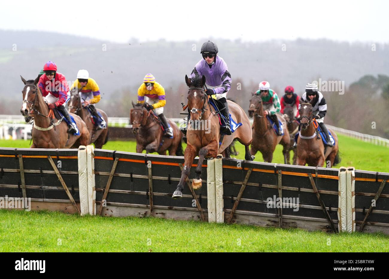 Go West ridden by jockey Harry Cobden (centre) on their way to winning ...