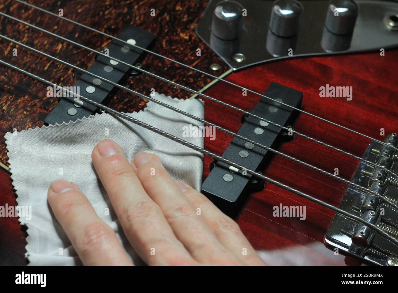 Cleaning and Polishing Electric Bass Guitar with Microfiber Cloth ...