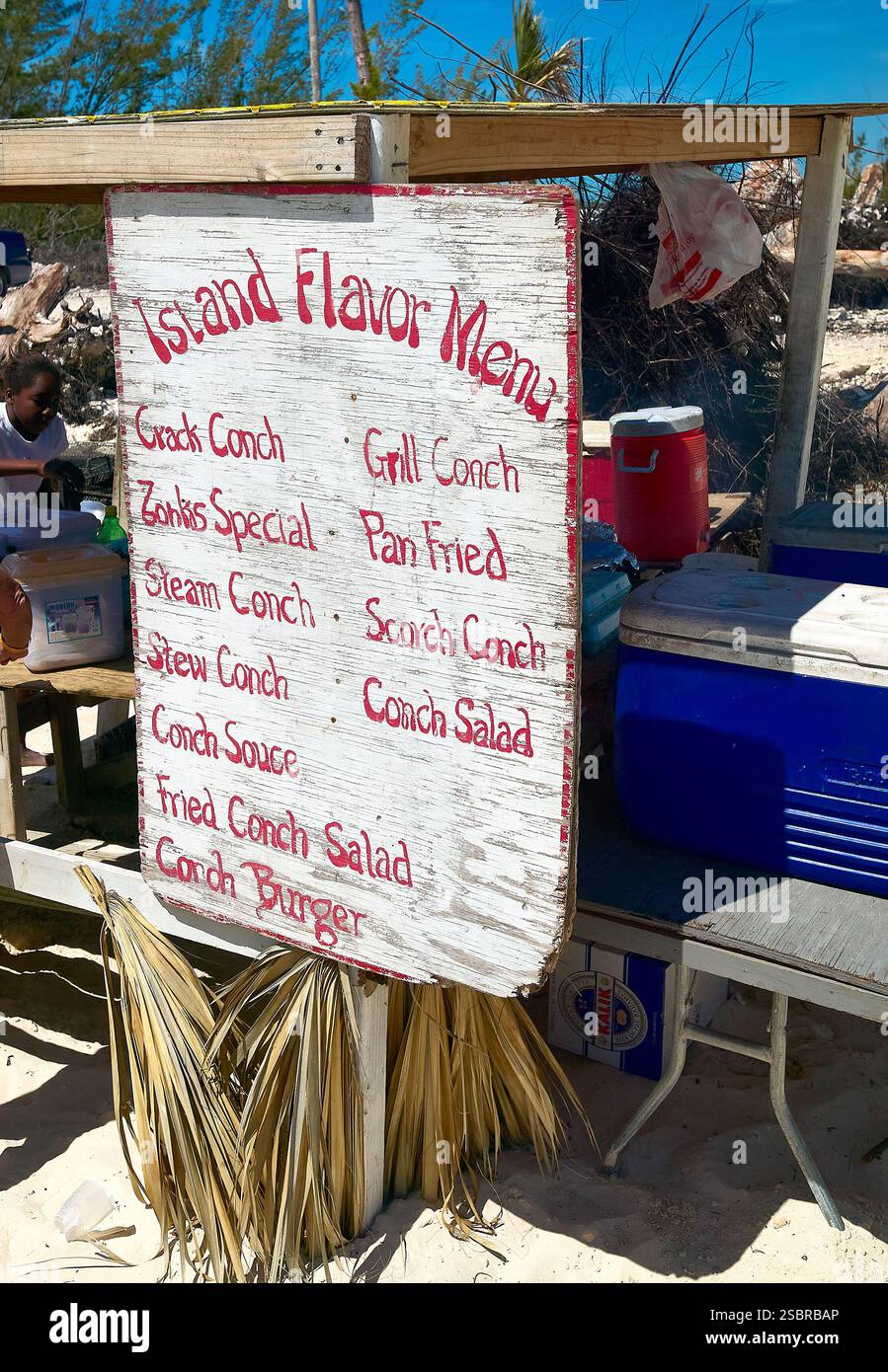 Rustic Outdoor Conch Shack Menu Sign on a Sunny Beach Background in the ...
