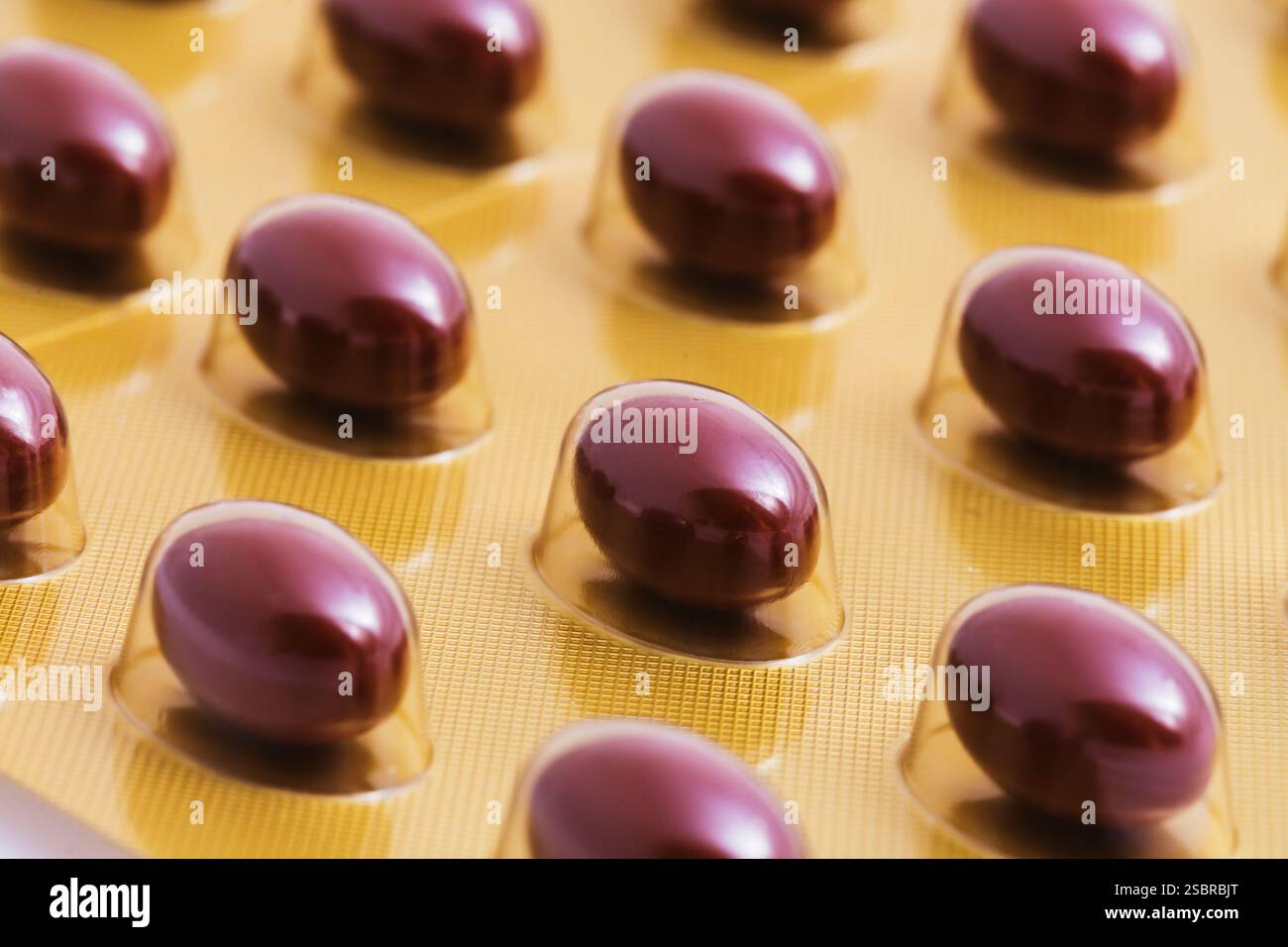 the color pill or just salmon oil capsules Stock Photo - Alamy