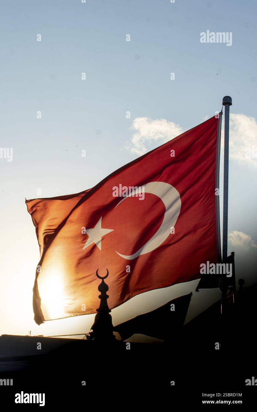 Turkish national flag with white star and moon on a pole in sky Stock ...