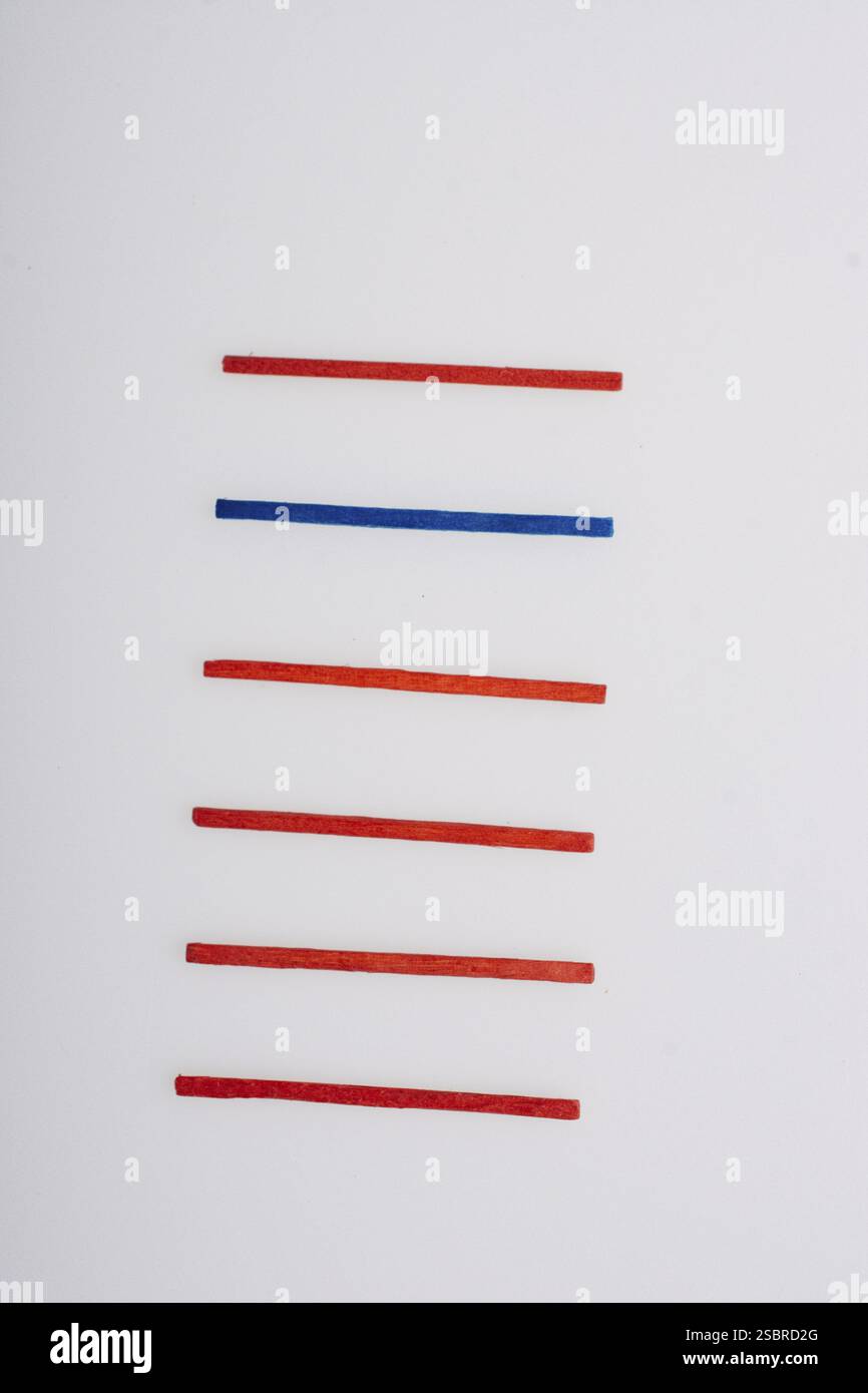 Sticks of various colors on awhite background Stock Photo - Alamy