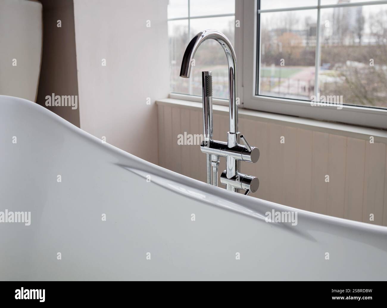 Modern Stainless Faucet for Tub. Chrome Tap Stock Photo - Alamy