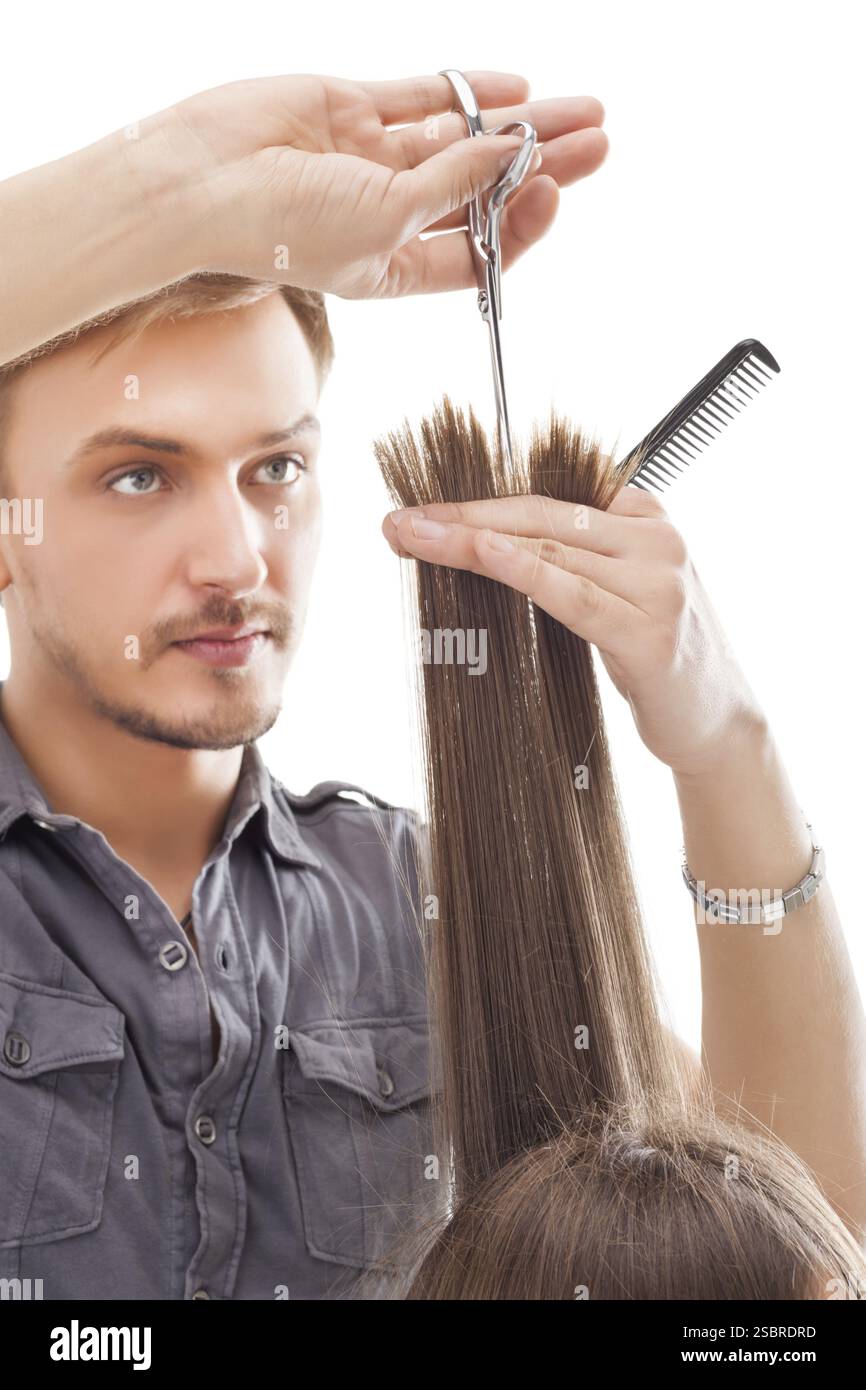 Professional hairdresser with long hair model, isolated on white Stock ...