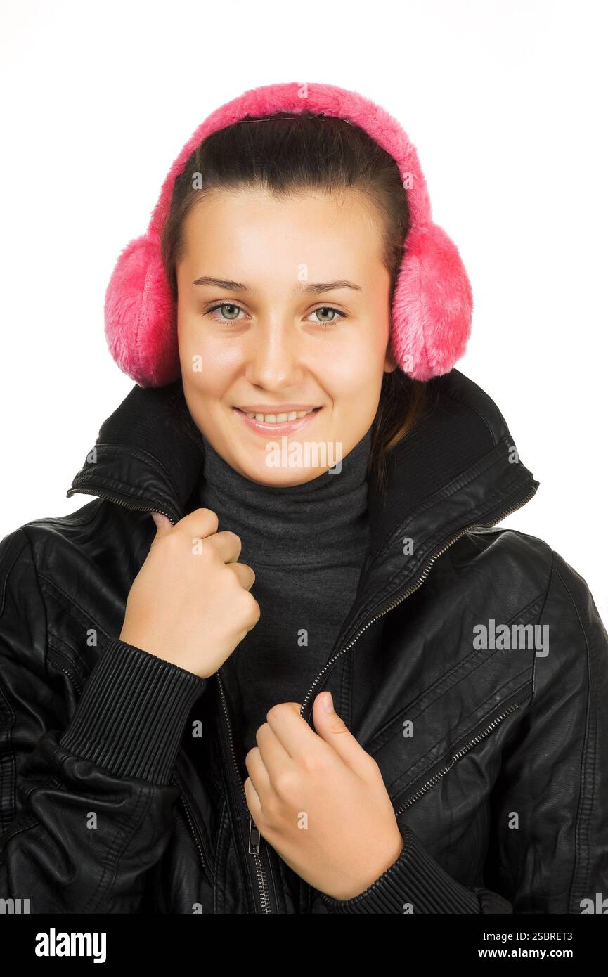 Young beautiful girl in the jacket is isolated on a white background ...