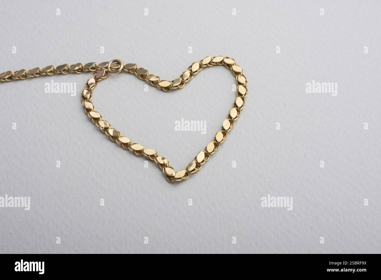Heart shaped made of gold chain Valentines Day, love, romance concept ...