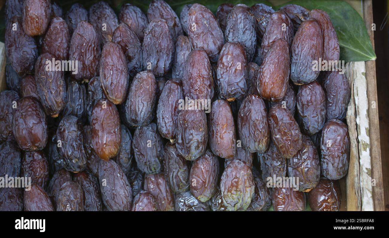 Sweet dried dates background hi-res stock photography and images - Alamy
