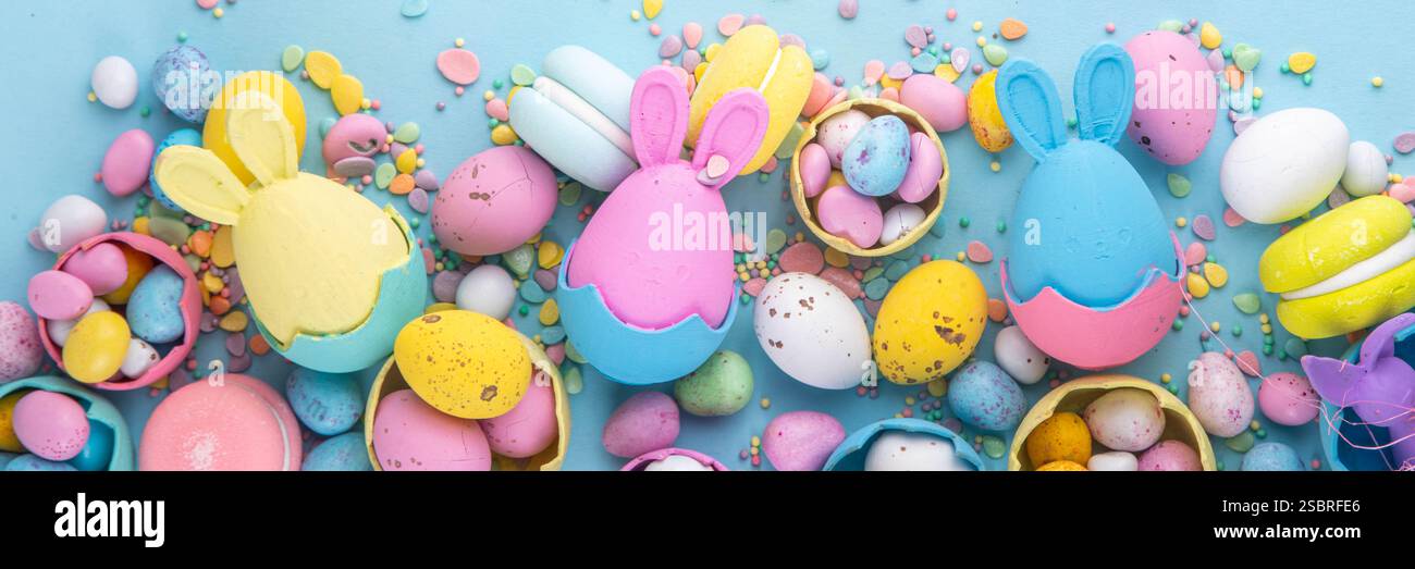 Cute and bright pastel colored Easter eggs and bunny background. Pink ...