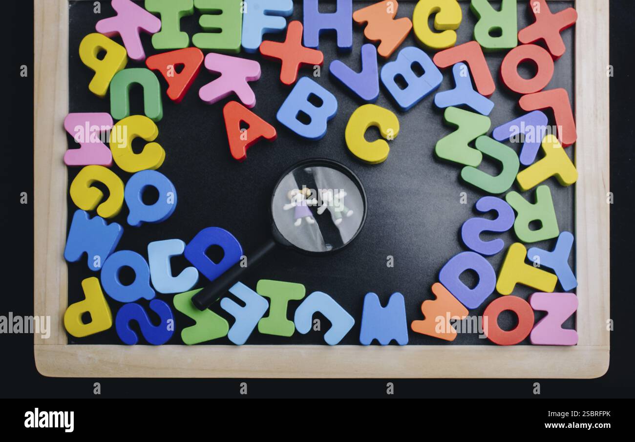Kids under Magnifying glass and Colorful Letters of Alphabet Stock ...