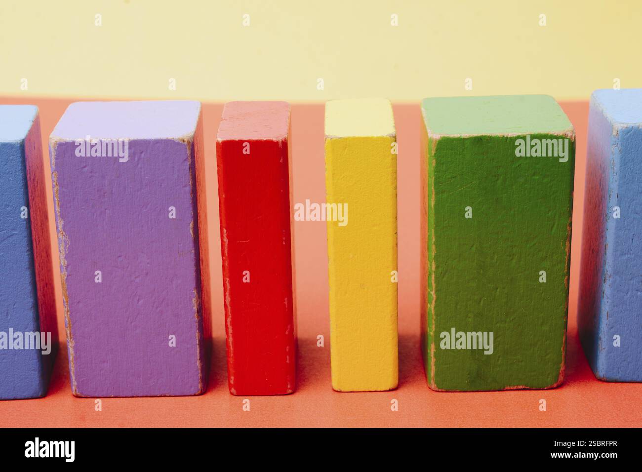 Different color and shape wooden toy building blocks Stock Photo - Alamy