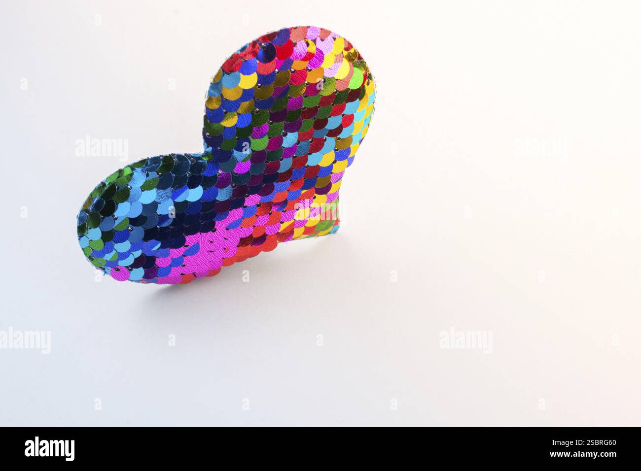 Bright multi color heart shaped object on white background Stock Photo ...