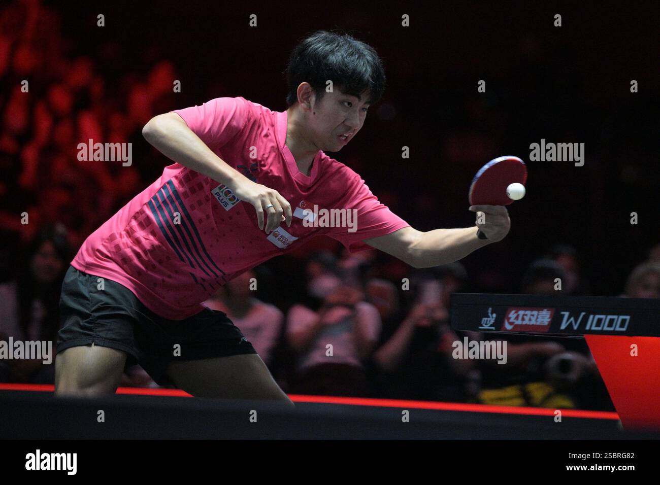 Singapore. 4th Feb, 2025. Pang Koen hits a return during the men's ...