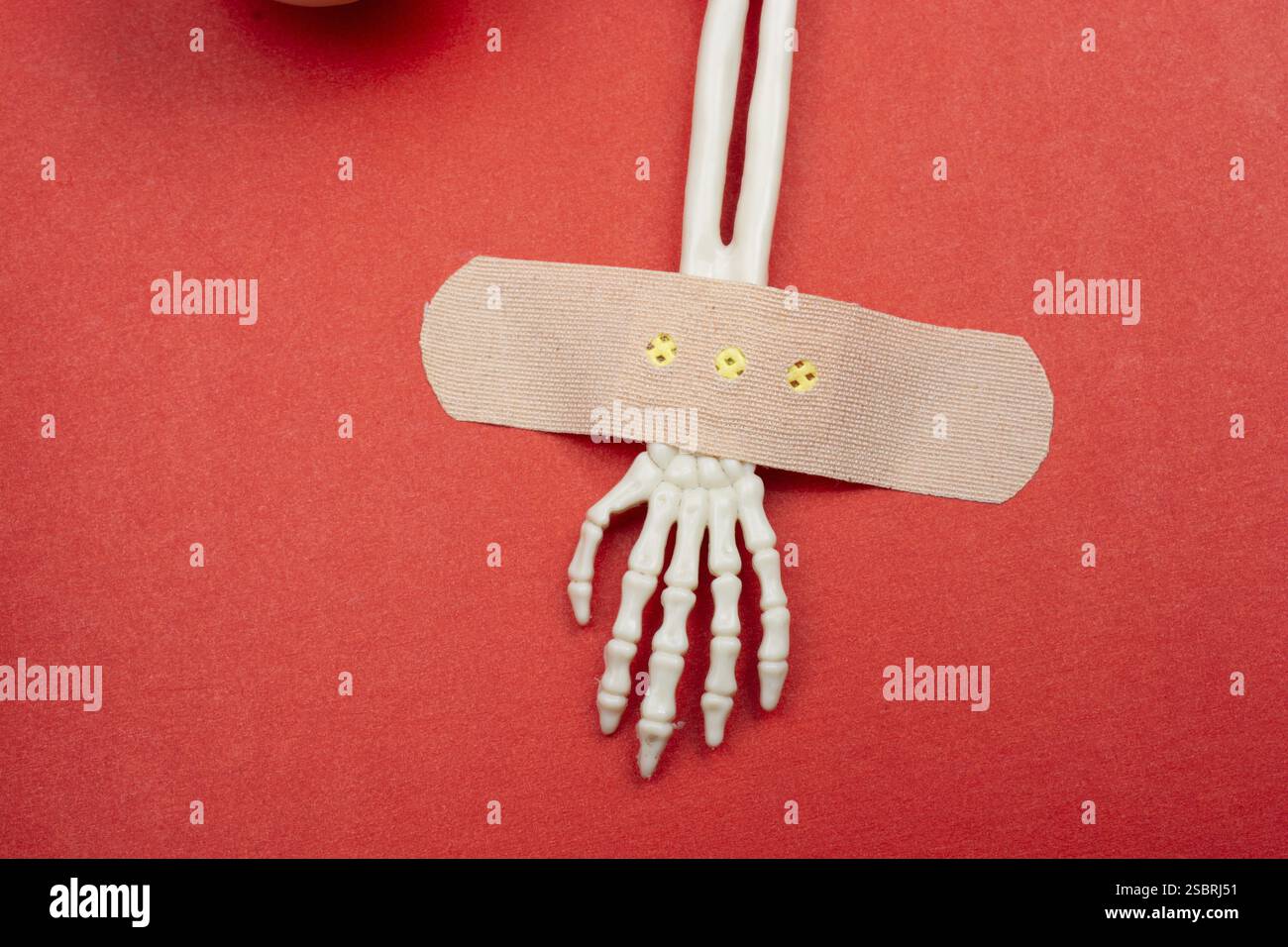 Plaster band on Skeletal hands for death and mistery concept Stock ...