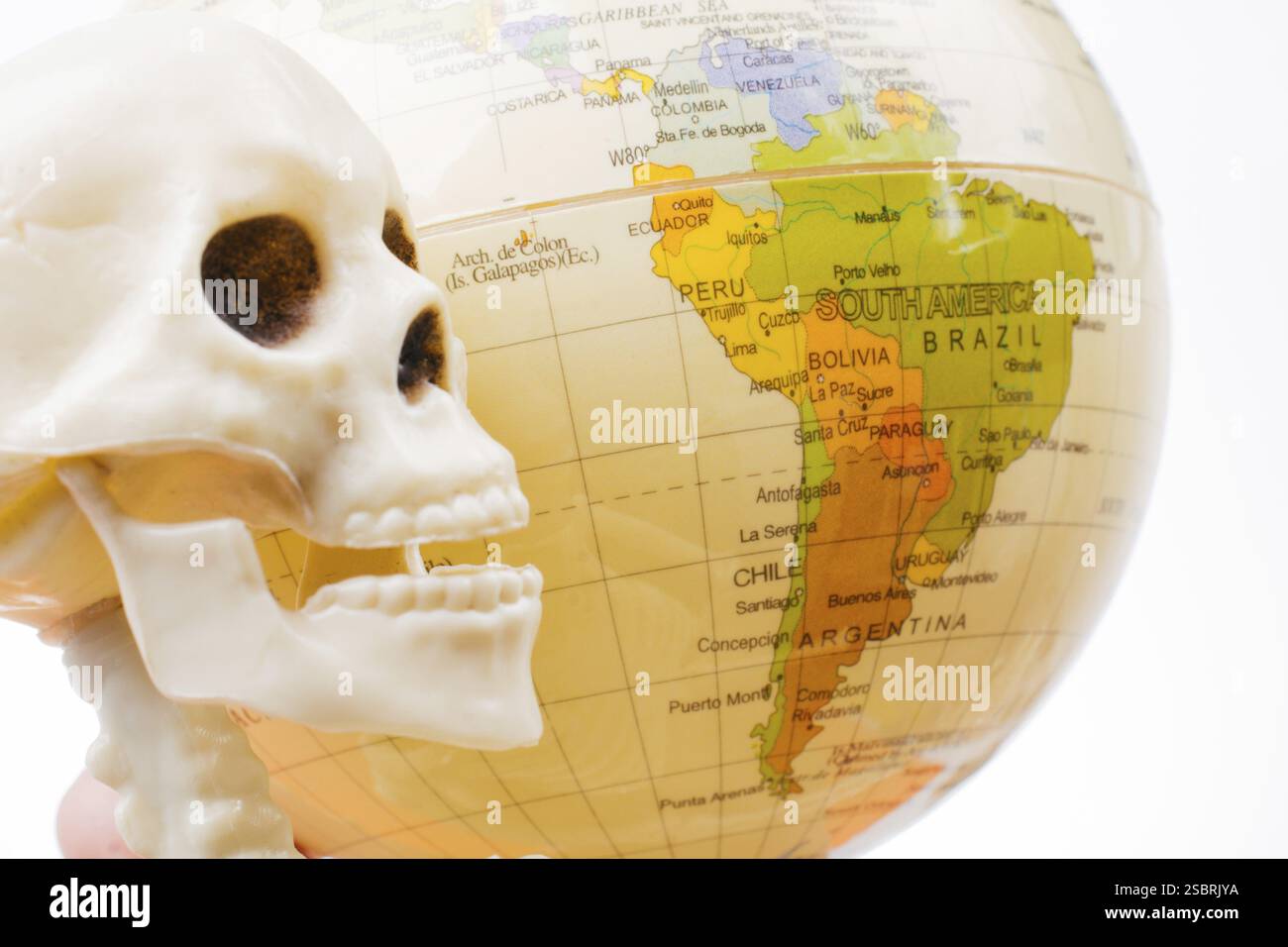 The earth in a skeleton hand Stock Photo - Alamy
