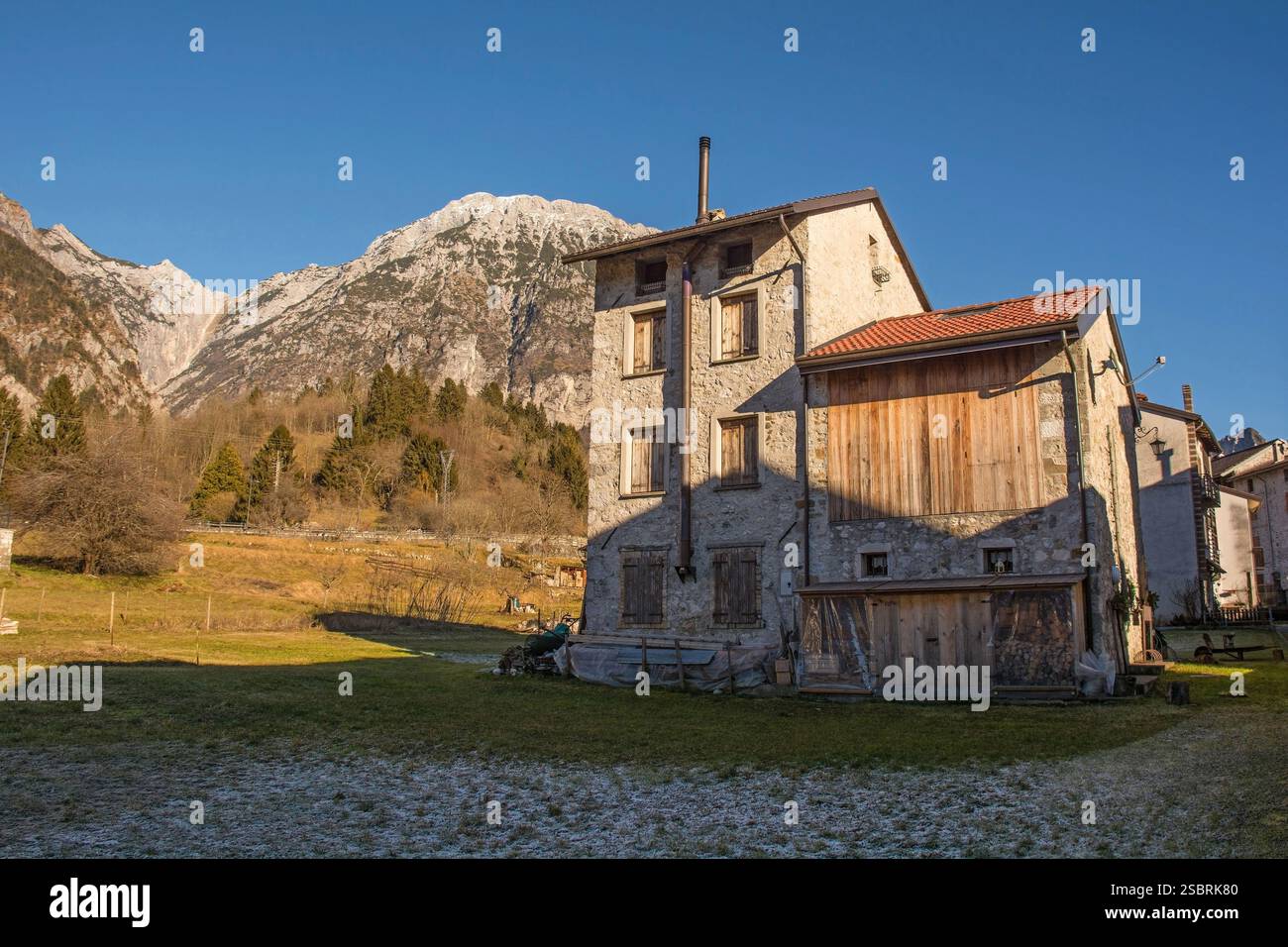 Traditional stone mountain houses in the historic village of Andreis in ...