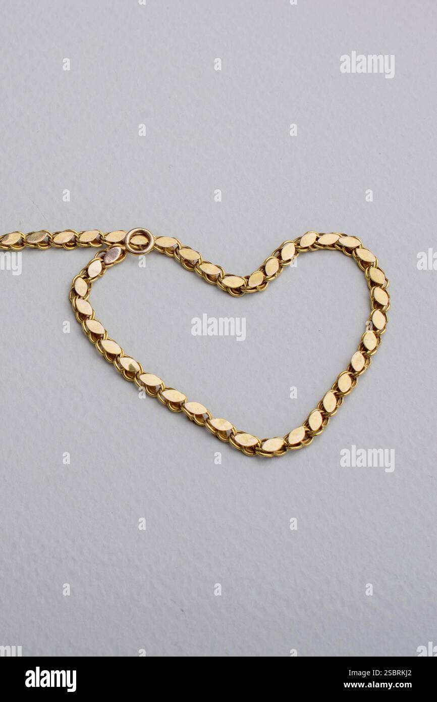 Heart shaped made of gold chain Valentines Day, love, romance concept ...