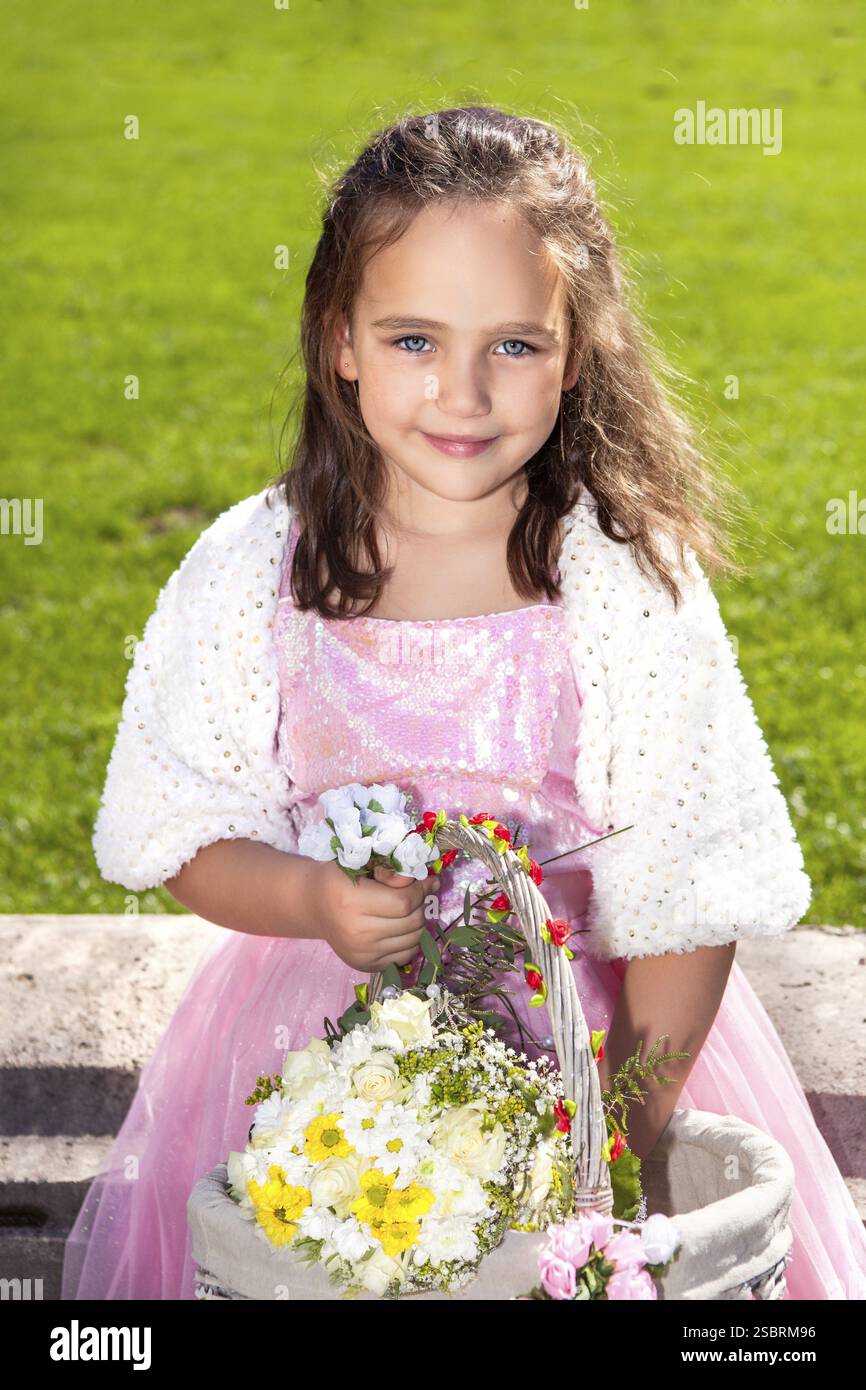 Wedding - Flower Girl in a beautiful rosa dress Stock Photo - Alamy