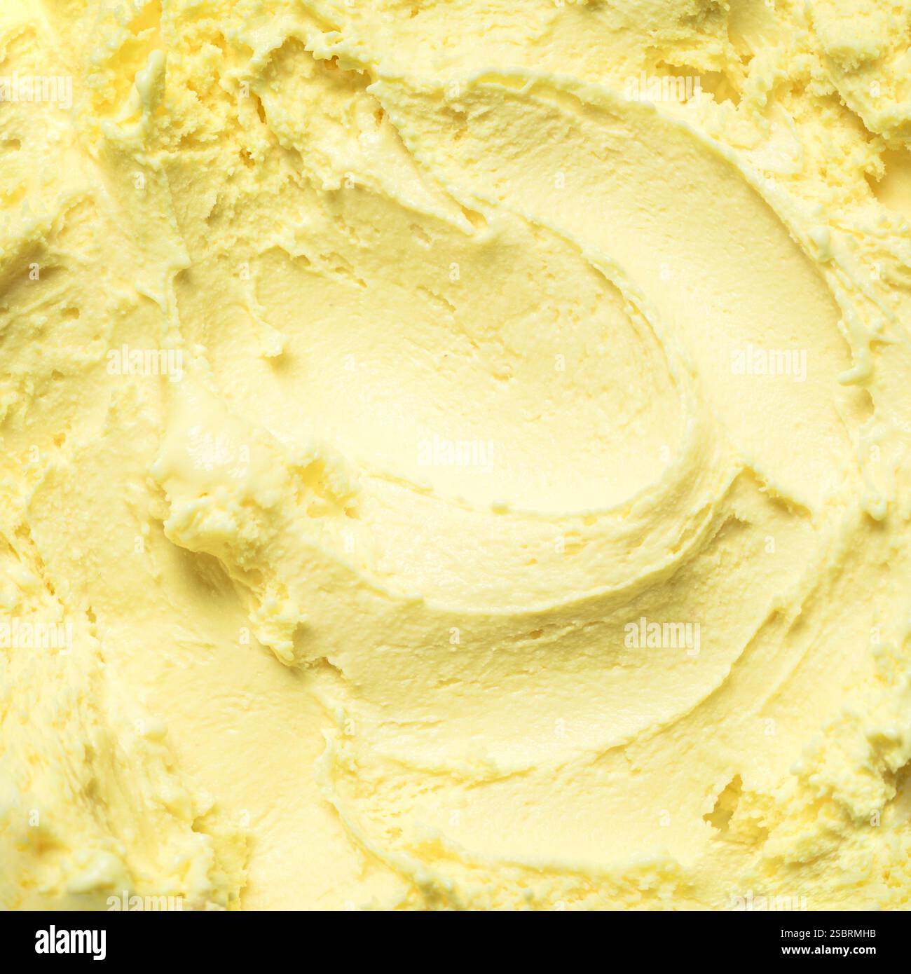 Yellow mango fruit ice cream texture as background. Banana coconut ...