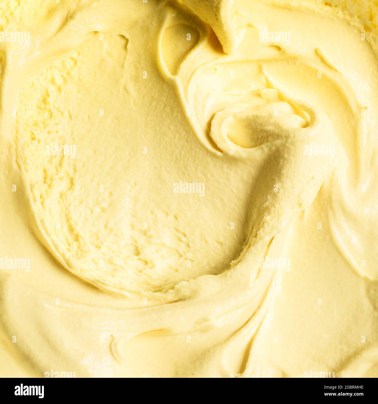 Yellow mango fruit ice cream texture as background. Banana coconut ...