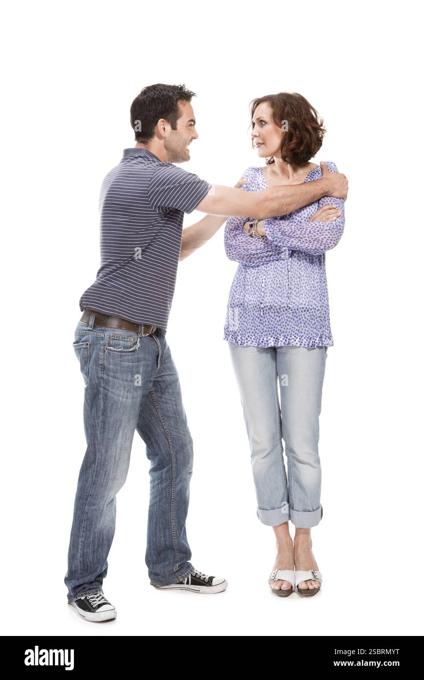 Angry couple yelling at each other isolated over white Stock Photo - Alamy