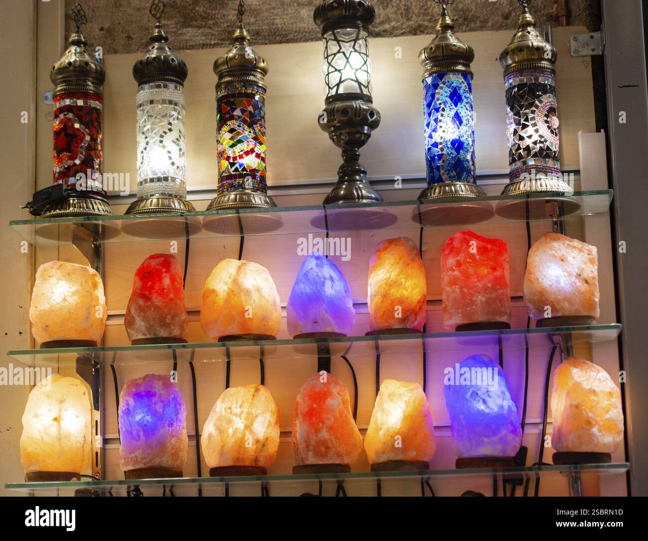 Organic Himalayan salt lamps illuminate in multi colors Stock Photo - Alamy
