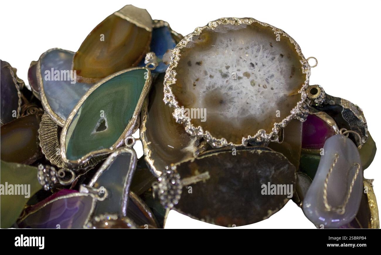 Colorful semi-precious stones. Different shapes rock pebbles. Semi ...