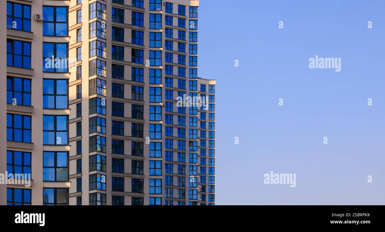 City view on a sunny day. Modern buildings, walls and windows Stock ...