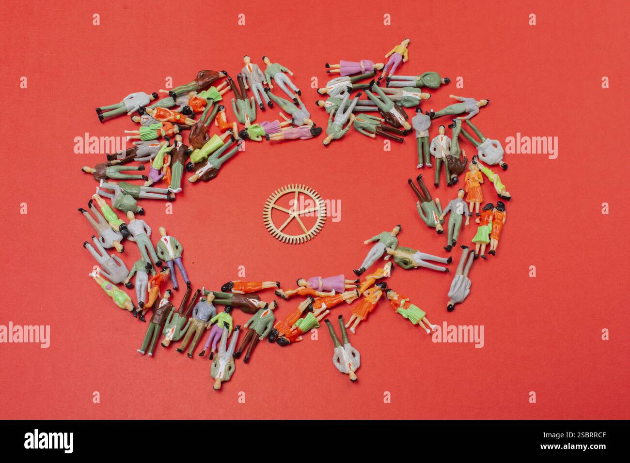 Colorful diverse miniature people figurines make crowd on ground Stock ...