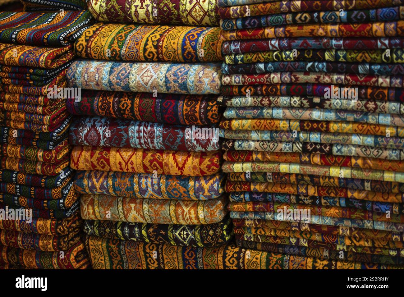 Traditional Turkish rug textile with patterns in bazaar Stock Photo - Alamy