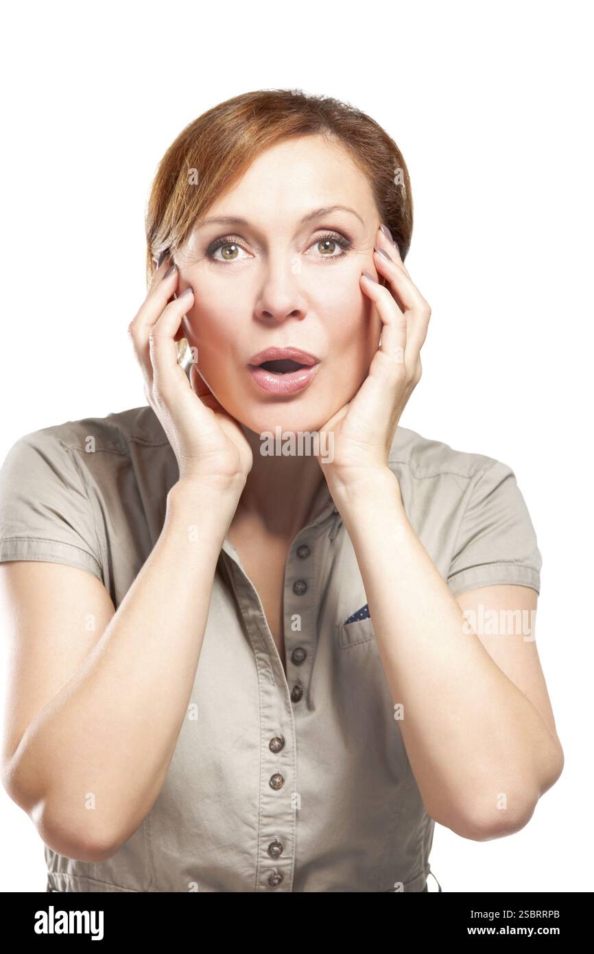 Woman looks camera surprised mouth hi-res stock photography and images ...