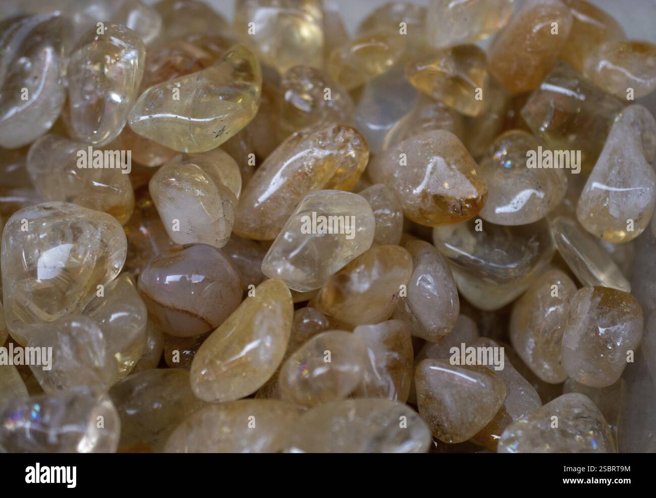 Tumbled scitrine gem stone as mineral rock geode Stock Photo - Alamy