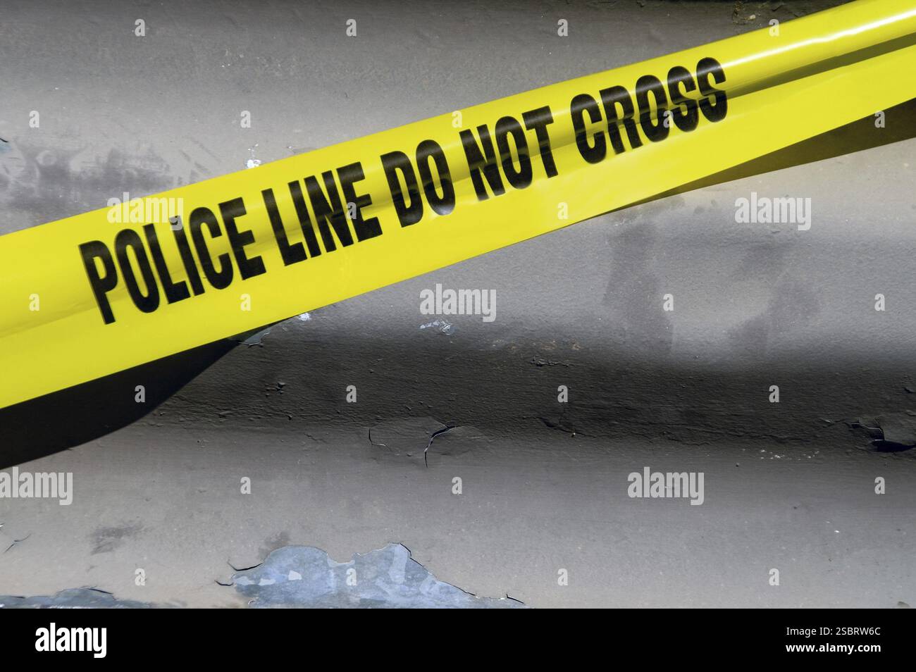 A line of police tape to cordon off a crime scene Stock Photo - Alamy