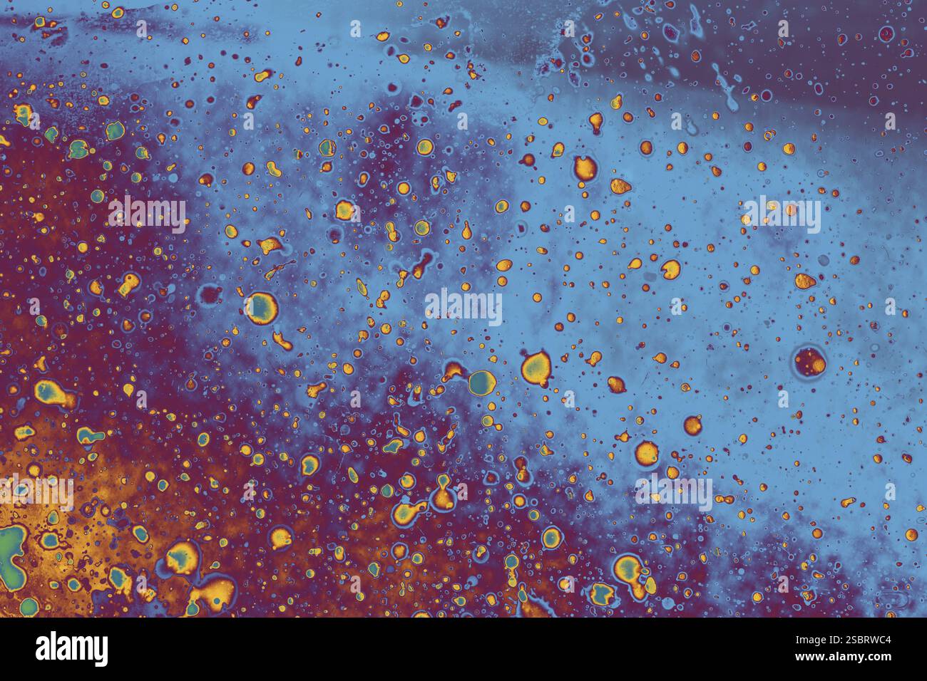 Abstract spots and stains on background formed by splashing watercolor ...
