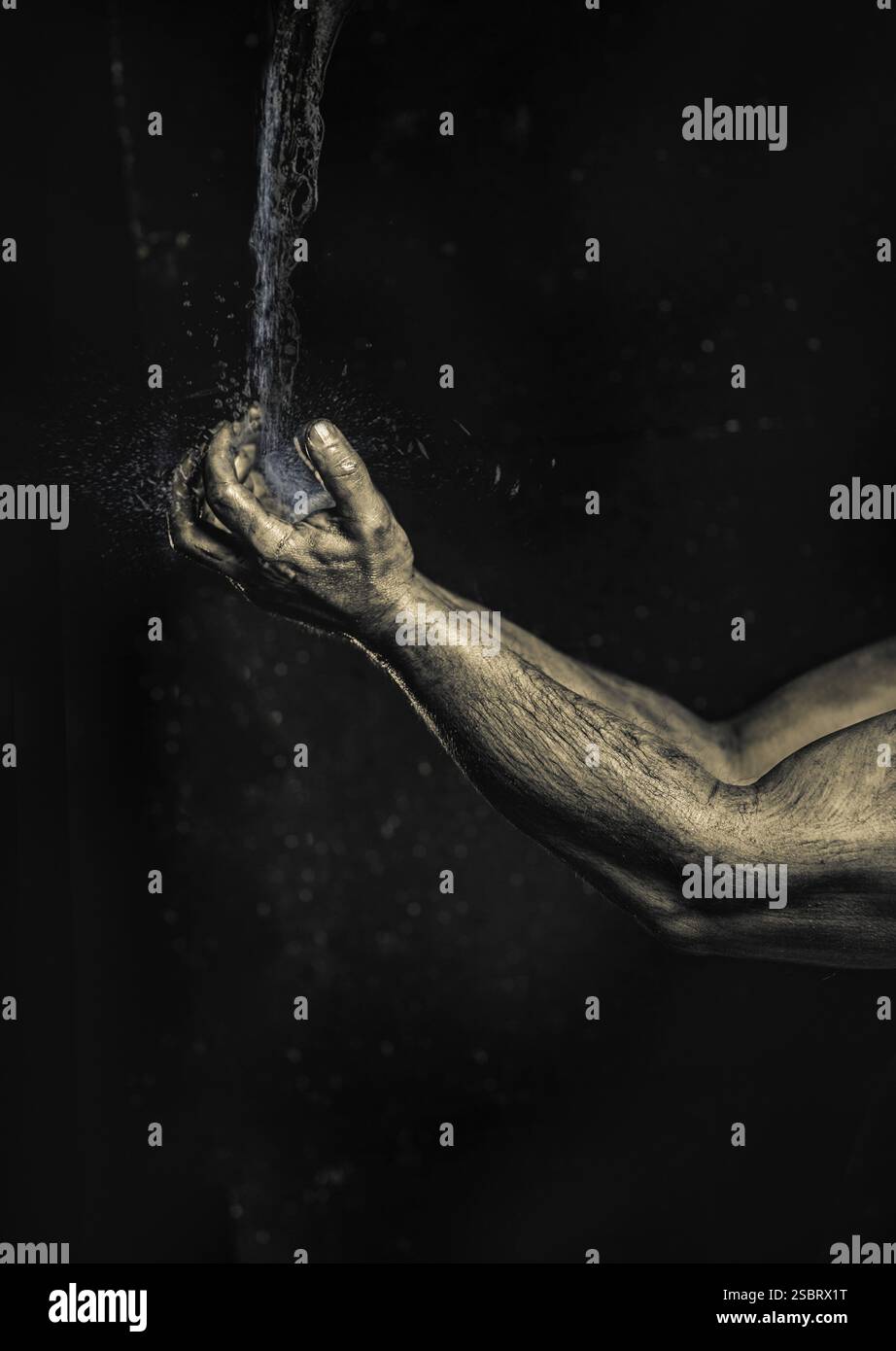 Close-up of a man's arm. Strong and power man's hand. Low key shoot ...