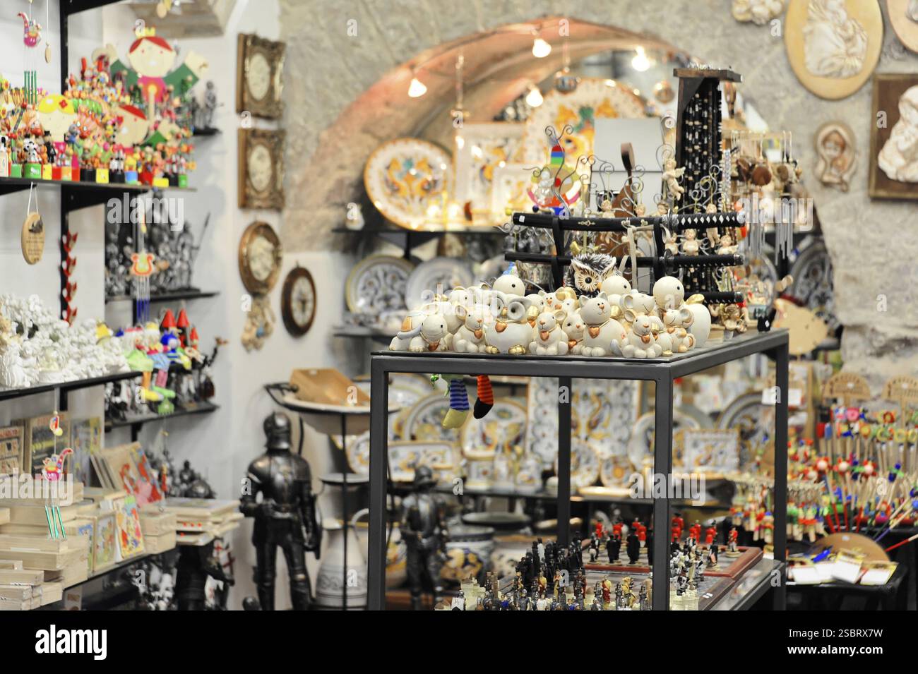 Colourful toy shop with shelves full of souvenirs and handcrafted ...