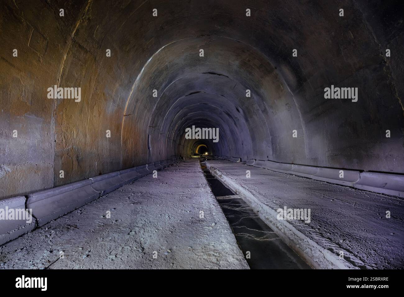 Dark large tunnel at old underground bunker Stock Photo - Alamy