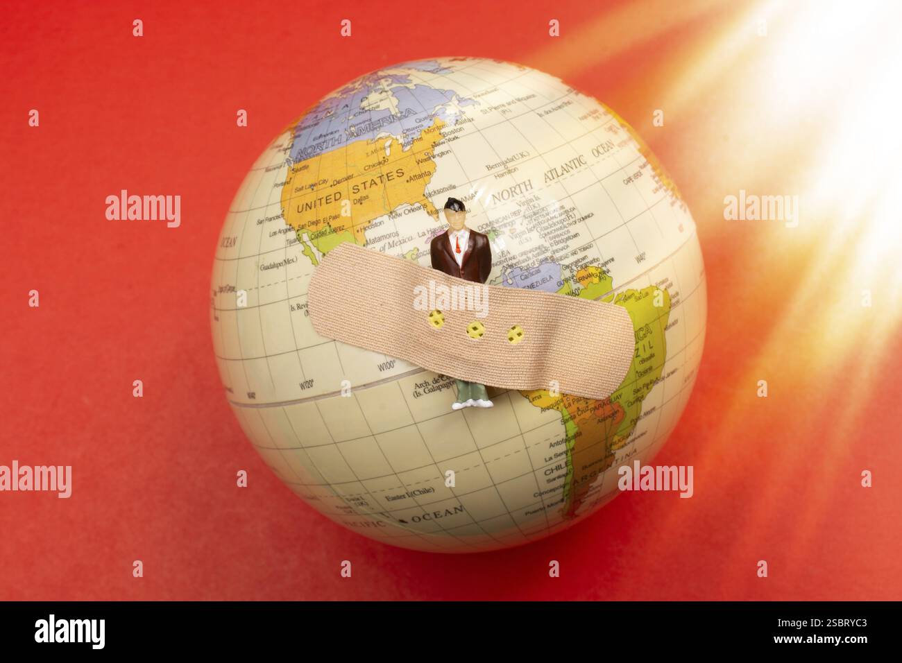Earth with bandaid Solidarity and aid to countries in need concept ...