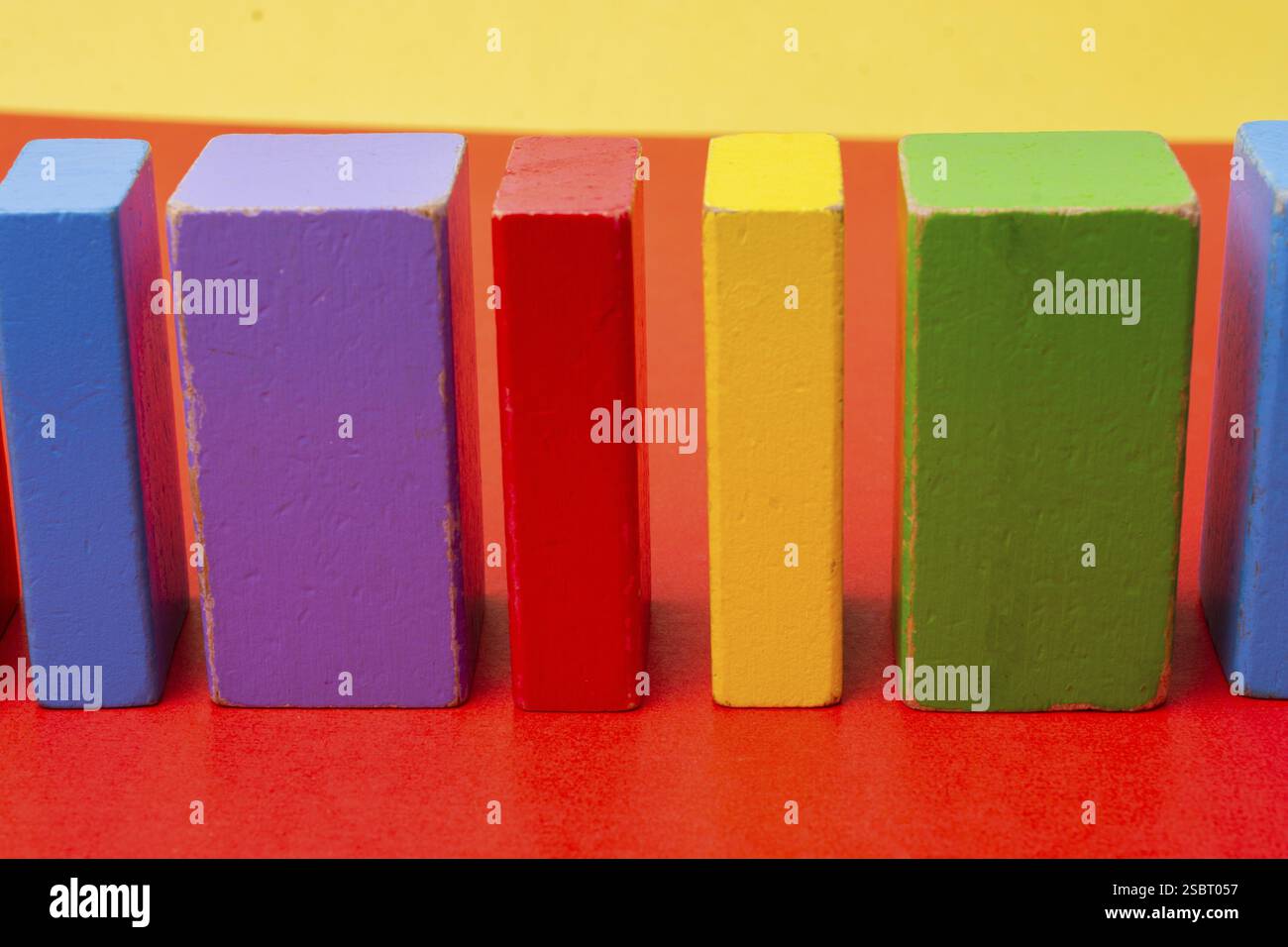 Different color and shape wooden toy building blocks Stock Photo - Alamy